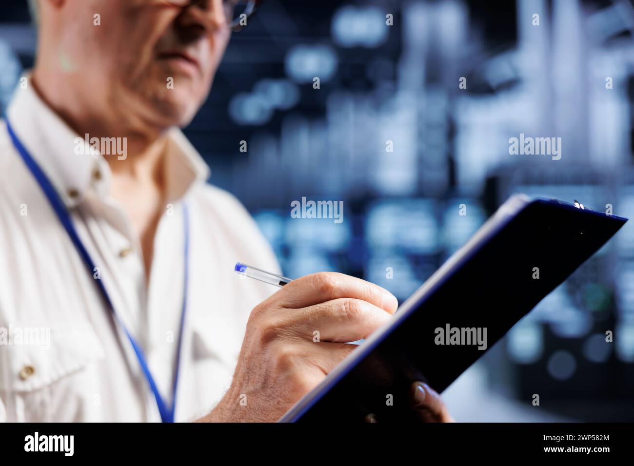 Skillful system administrator in crypto mining farm with specialized ...