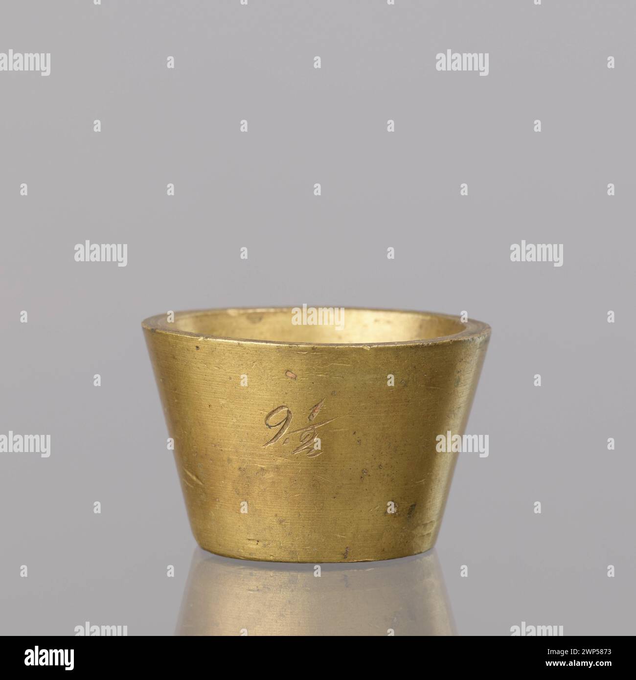 Metal weight from the 18th century, used in commerce to measure goods ...
