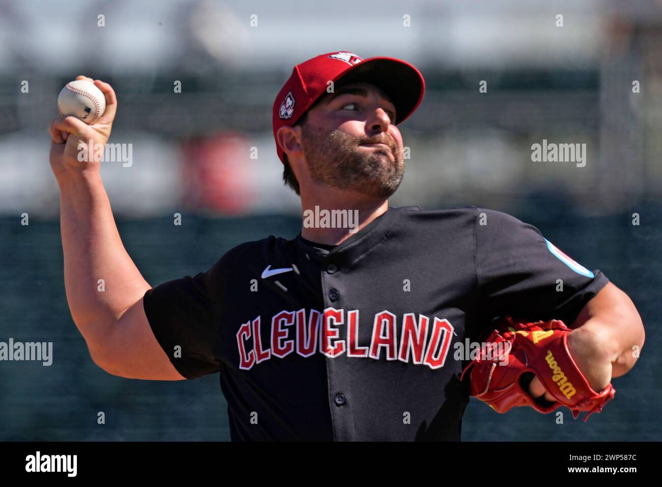Cleveland Guardians pitcher Tanner Burns throws during the third inning ...