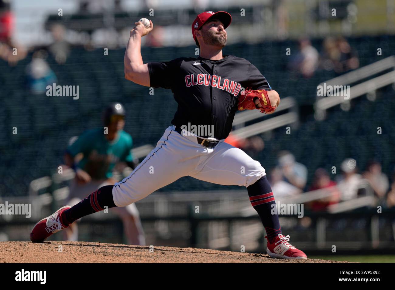 Cleveland Guardians pitcher Tanner Burns throws during the third inning ...
