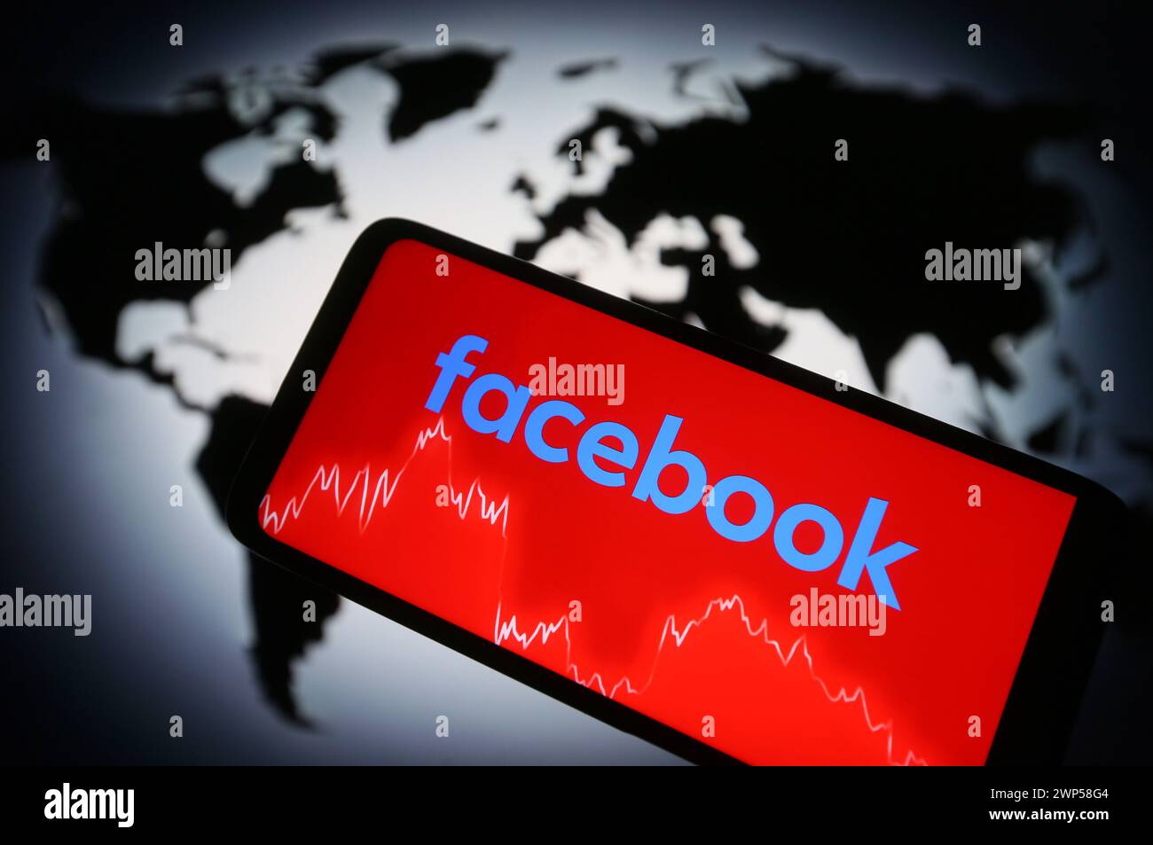 In this photo illustration, a Facebook logo is seen on a smartphone ...