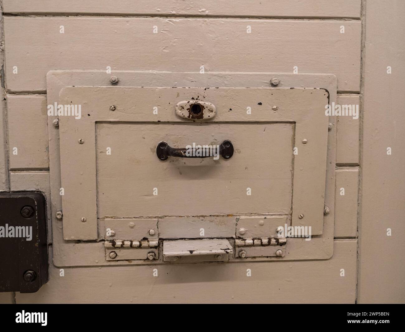 Outside view of prison cell hatch in the cell wing of the former Cold ...