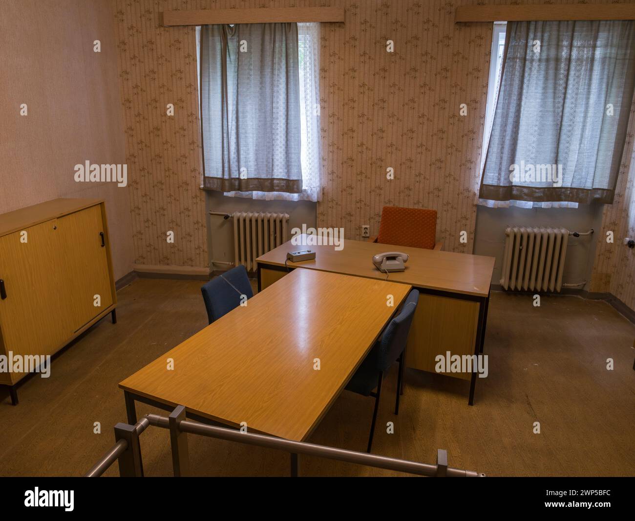 Interrogation room in the former Cold War Stasi prison Hohenschönhausen ...