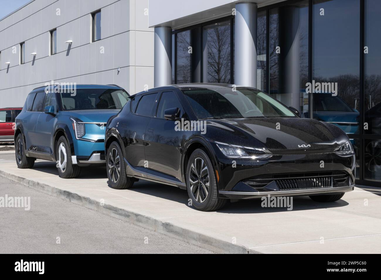 Indianapolis - February 3, 2024: Kia EV6 and EV9 EV Electric Vehicles. Kia offers the Kia EV6 ...