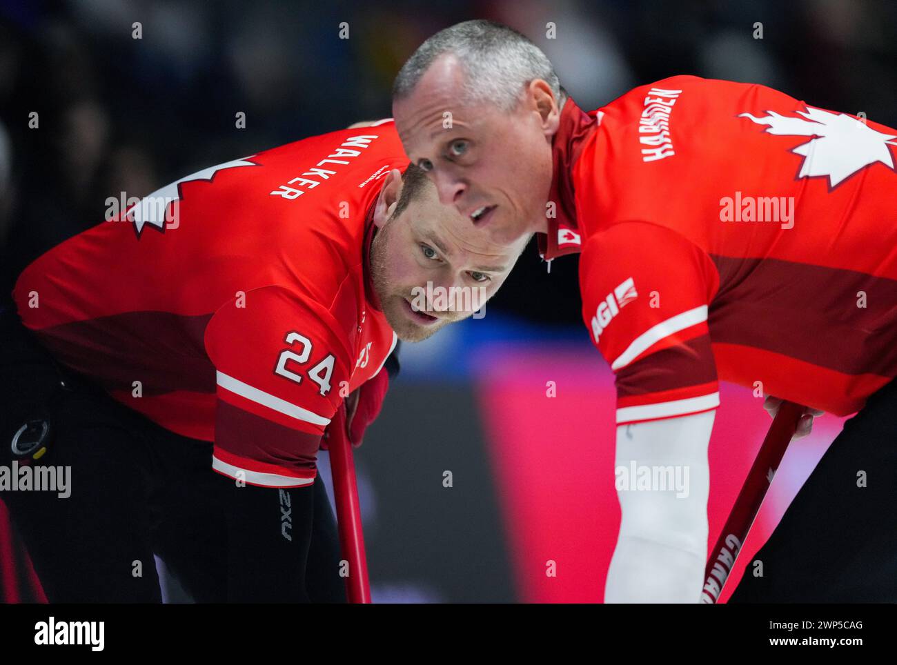 Regina, Canada. 05th Mar, 2024. Canada lead Geoff Walker, left, and second E.J. Harnden sweep ...