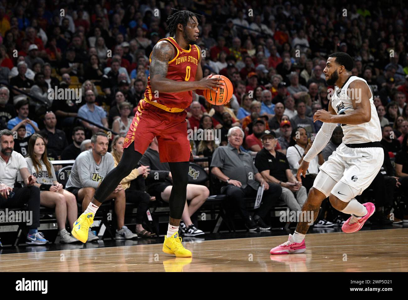 Iowa State forward Tre King (0) is defended by Central Florida guard ...