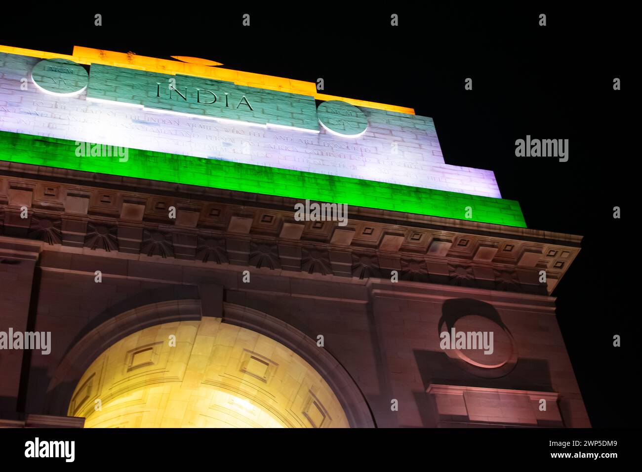 Image of India Gate at night with India flag colors projected on it ...