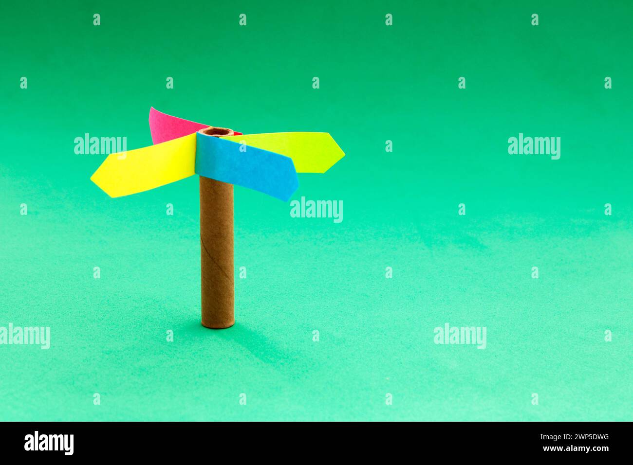 Colorful sign indicating four different directions Stock Photo - Alamy