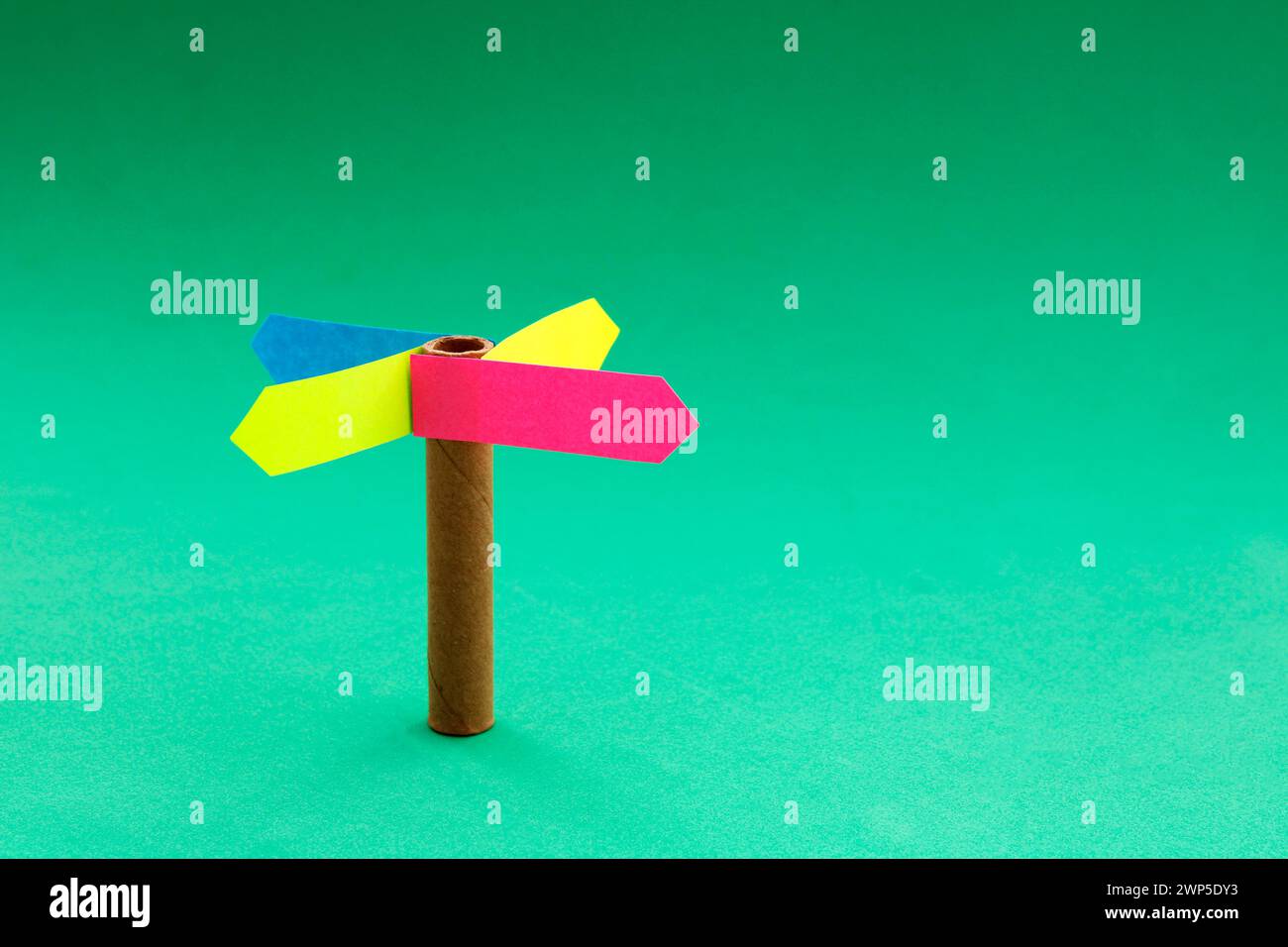 Colorful sign indicating different directions Stock Photo - Alamy