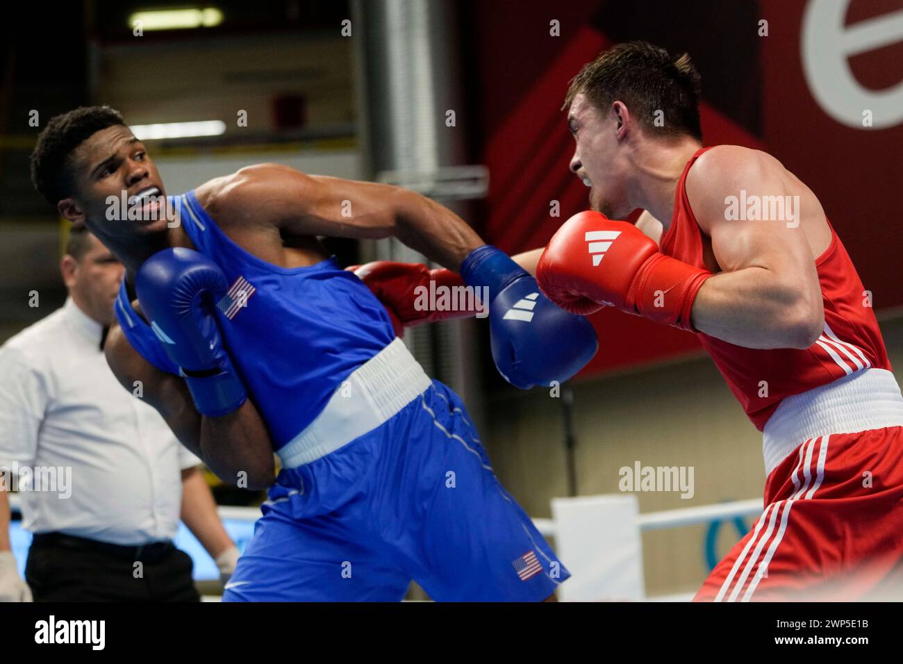 Belarus Aliaksandr Radzionau , right, competes for Individual Neutral ...