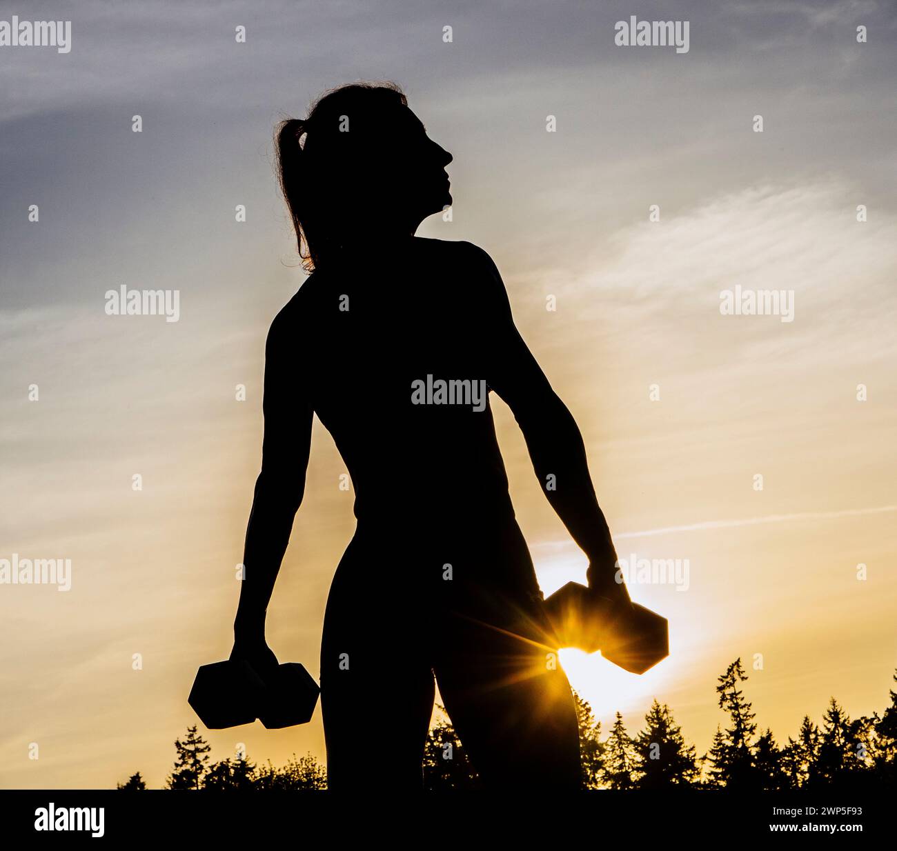 Female athlete working out Stock Photo - Alamy
