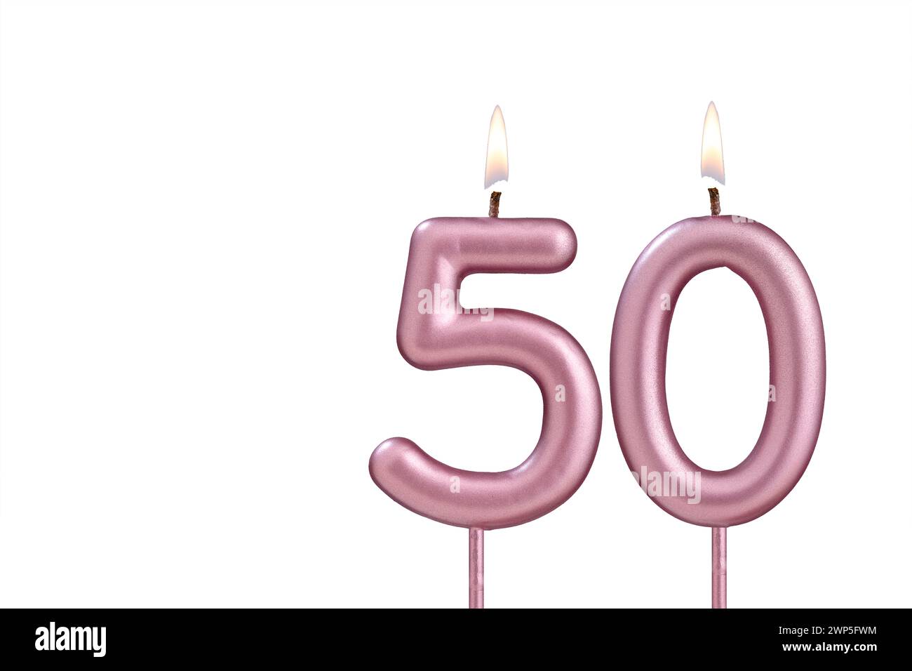 Lit birthday candle - Candle number 50 on white background Stock Photo ...