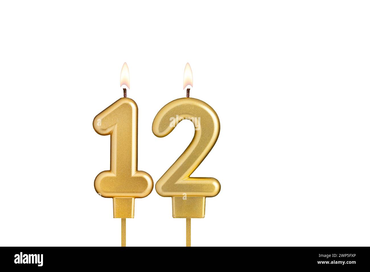 Birthday candle number 12 on white background Stock Photo - Alamy