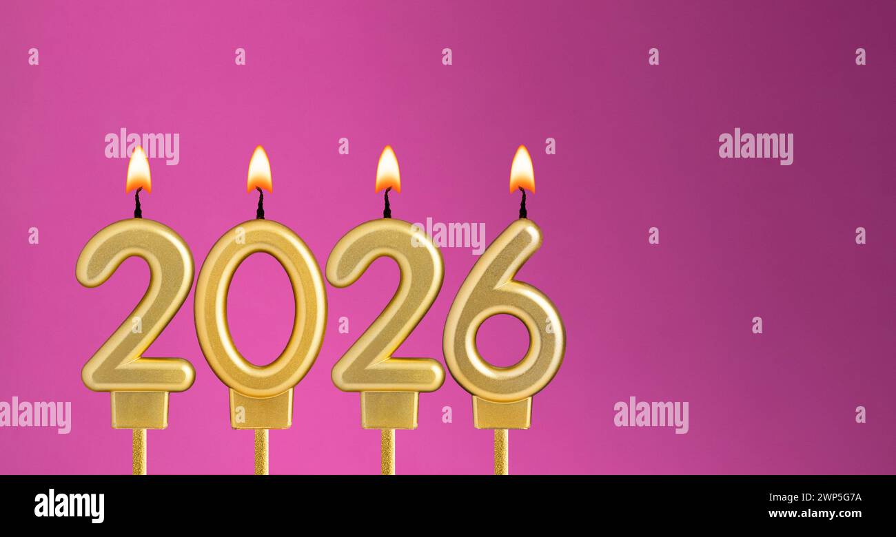 Happy New Year 2026 - Candles in the form of lit numbers Stock Photo ...