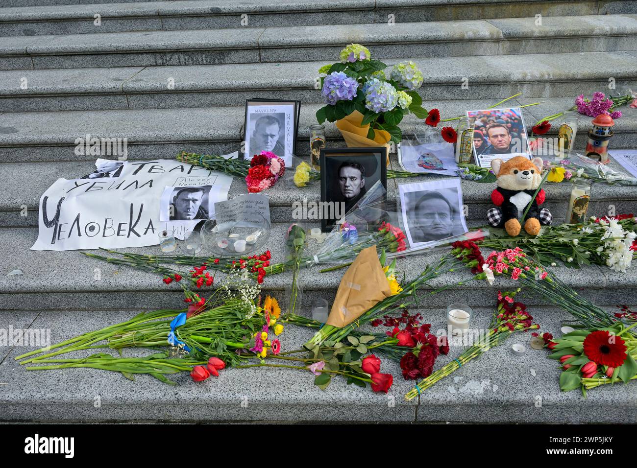 Impromptu memorial with flowers and photos remembering Russian activist ...