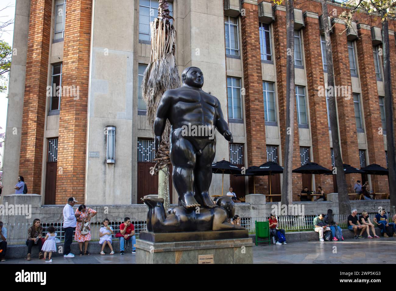 MEDELLIN, COLOMBIA - JANUARY 17, 2024: Walking Man. Bronze sculptures ...