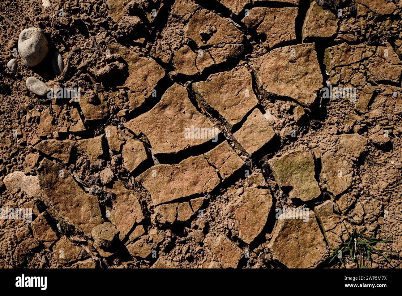 The dry riverbed of the Fluvia river as it passes by Sant Miquel de ...