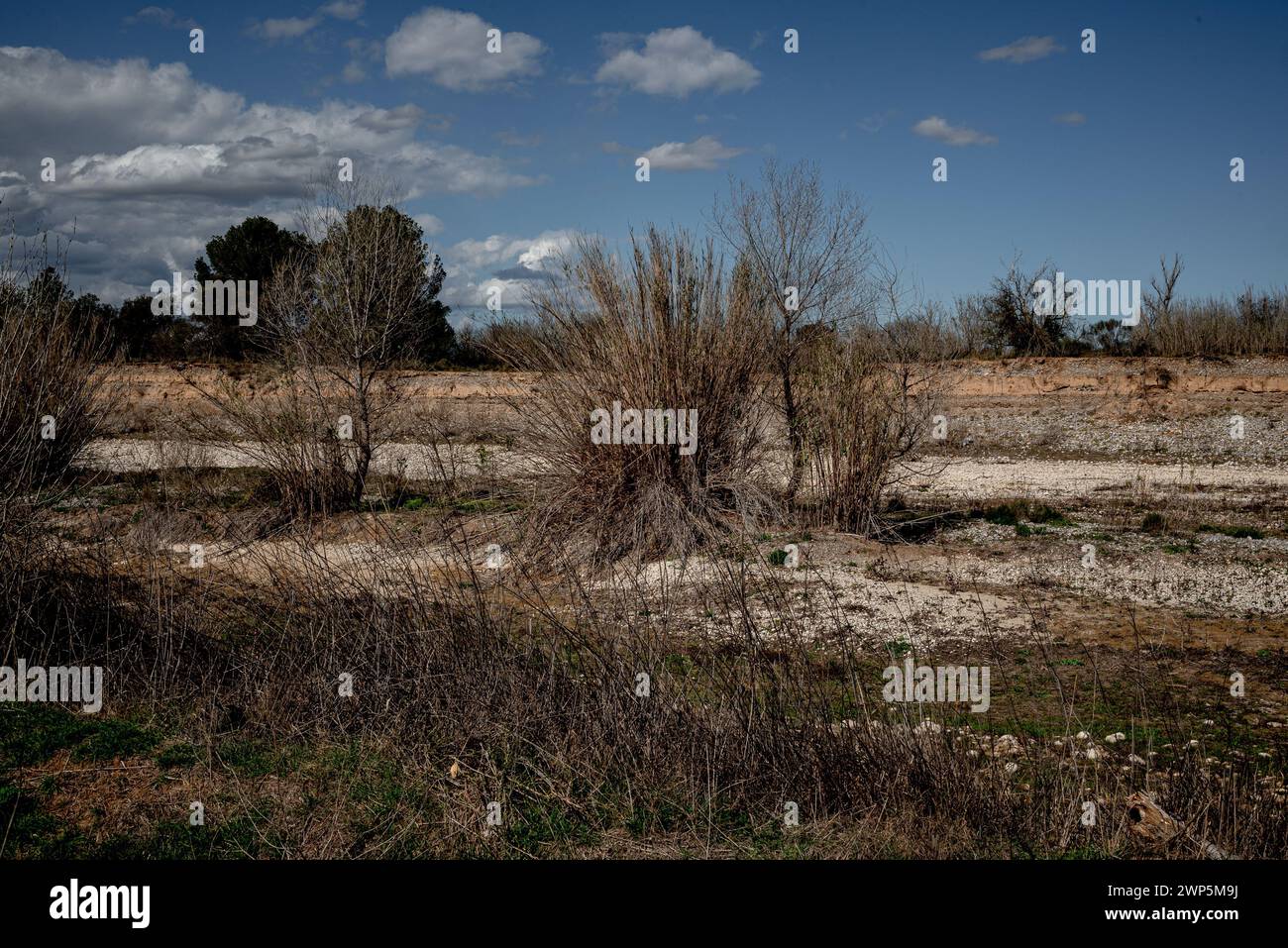 The dry riverbed of the Fluvia river as it passes by Sant Miquel de ...