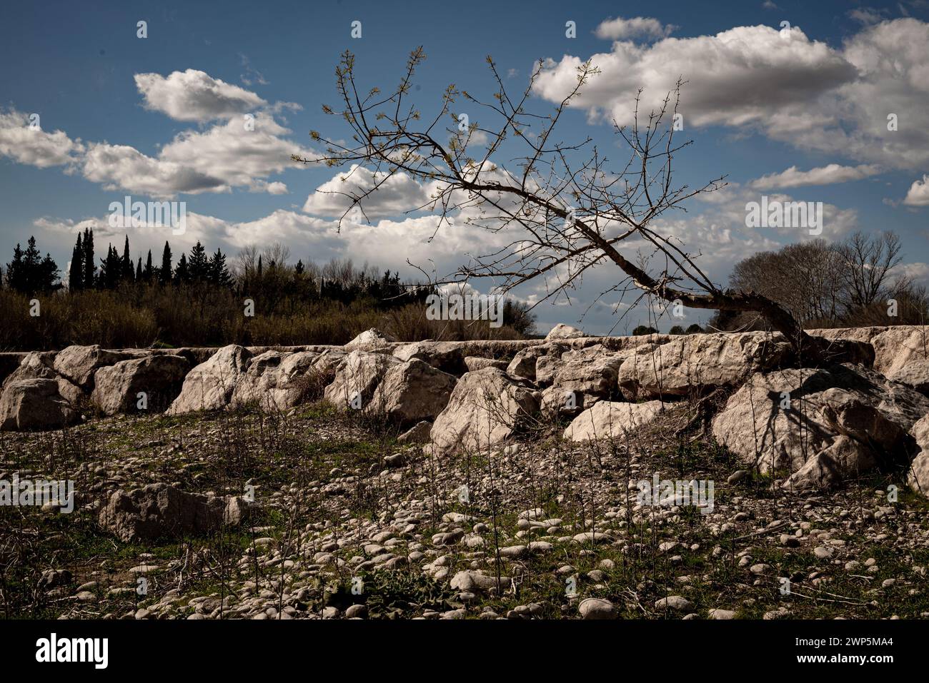 The dry riverbed of the Fluvia river as it passes by Sant Miquel de ...