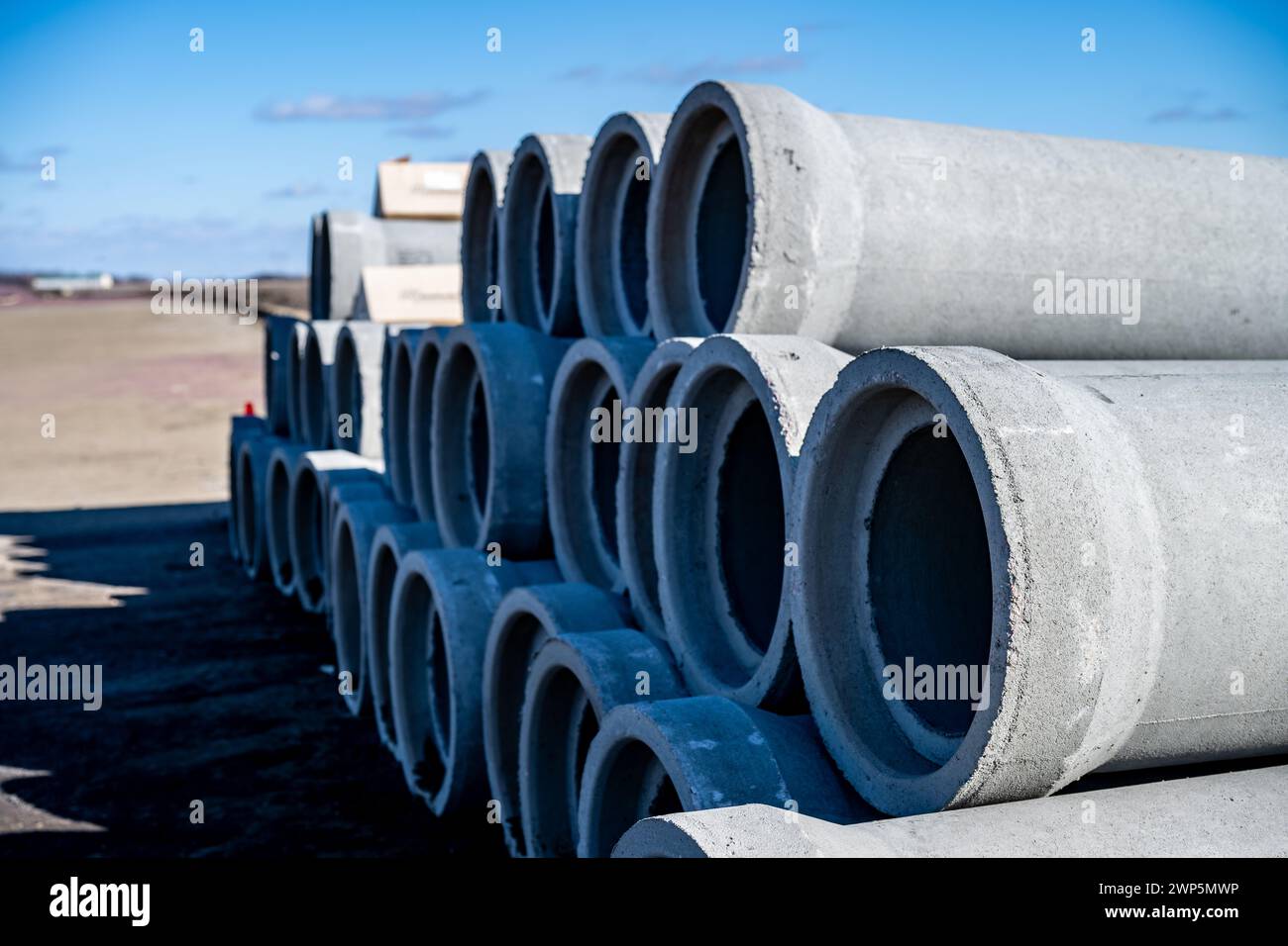Stacked concrete casing pipes for sewer and water in the sky Stock ...