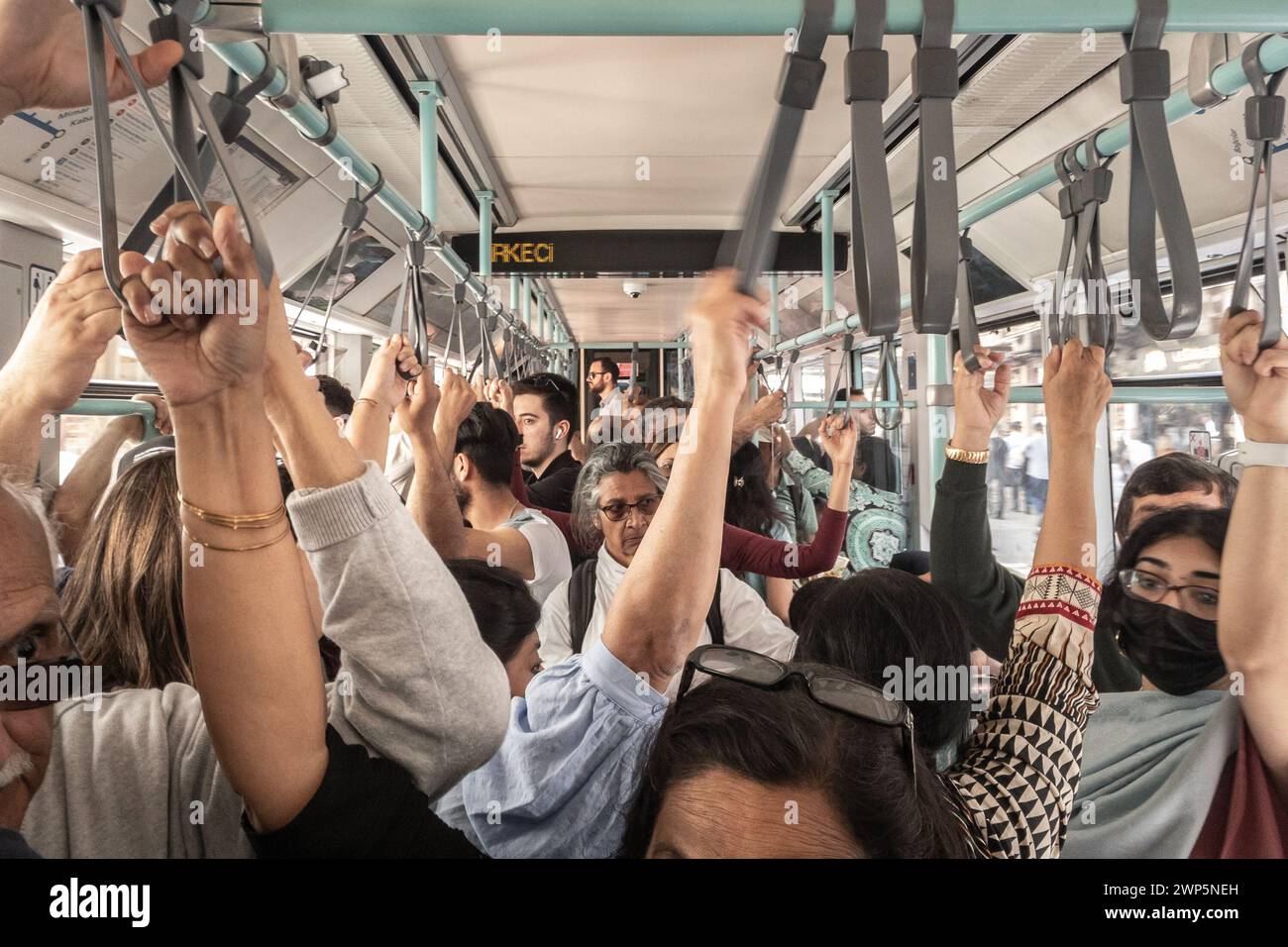 Picture of the interior of a tram in istanbul crowded with heavy ...