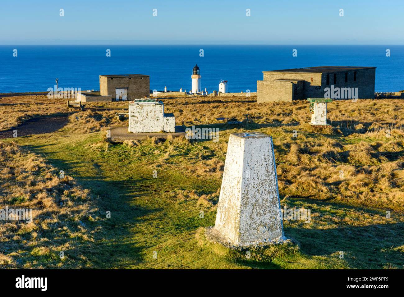 The trig point, lighthouse and abandoned Second World War military ...
