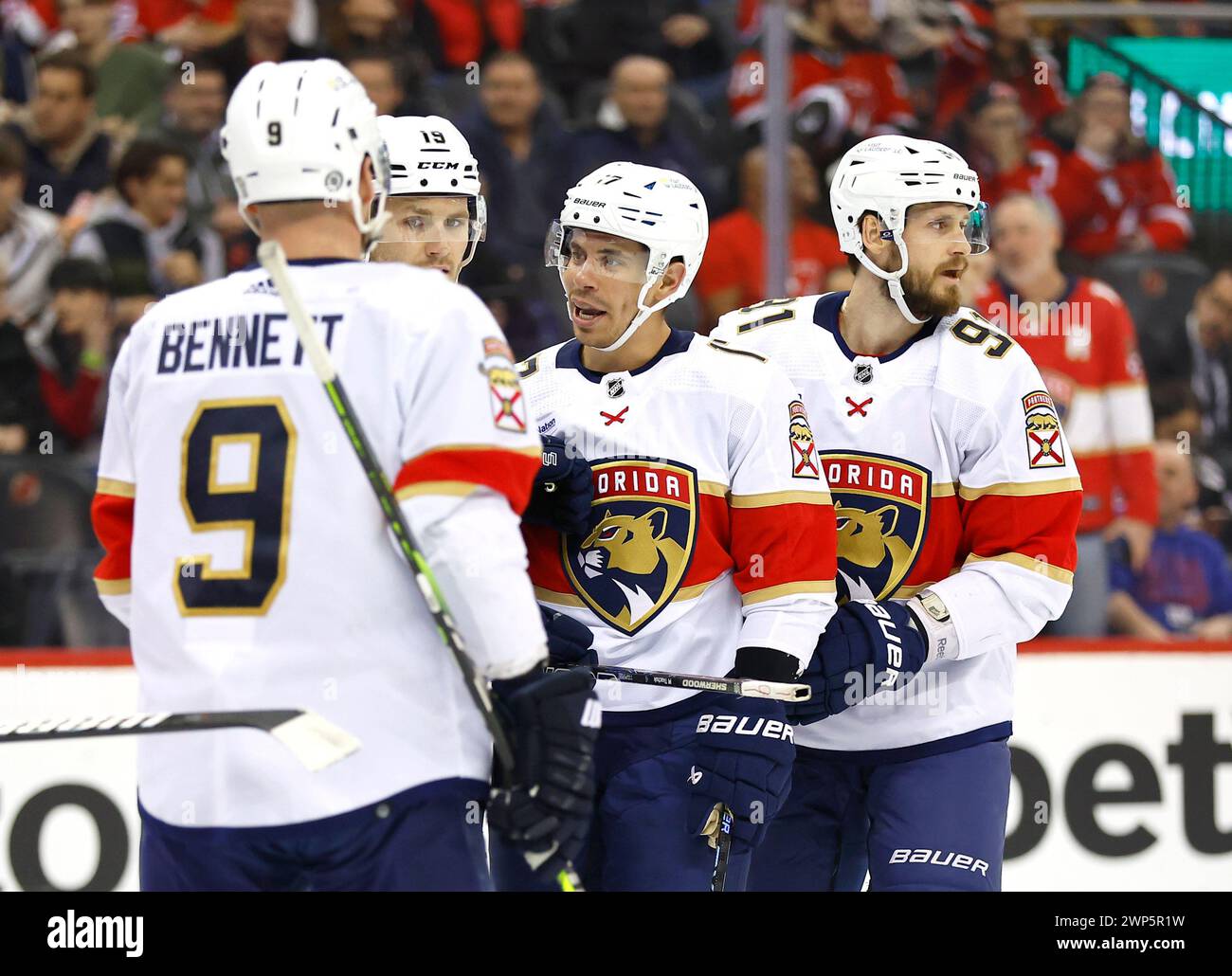 Florida Panthers center Evan Rodrigues (17) celebrates with teammates ...