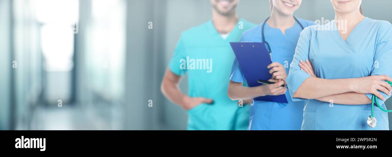 Doctors and nurse in hospital, closeup. Banner design with space for ...