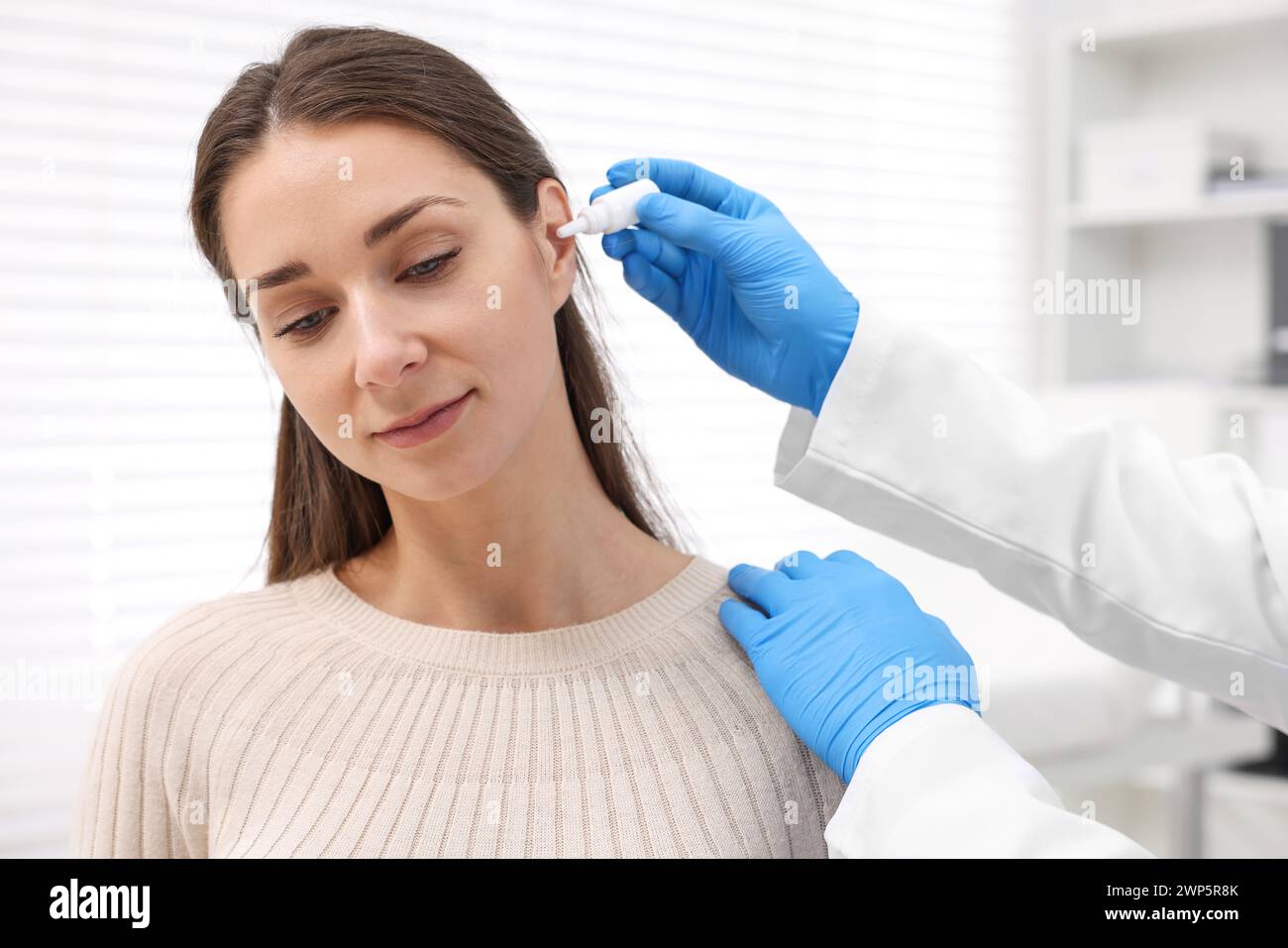 Ear drops doctor hi-res stock photography and images - Alamy