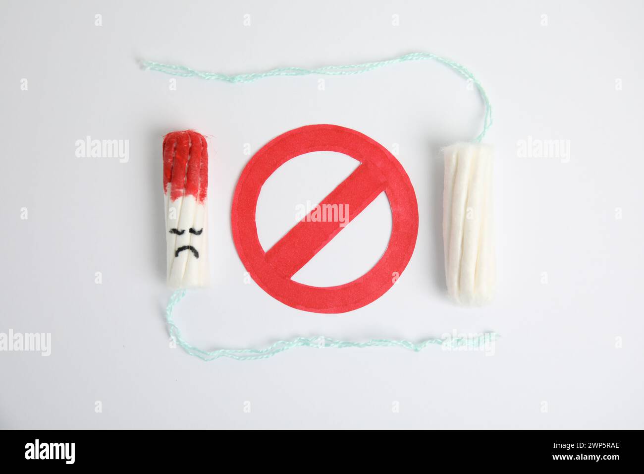 Clean and used tampons with sign Stop on light background, flat lay ...