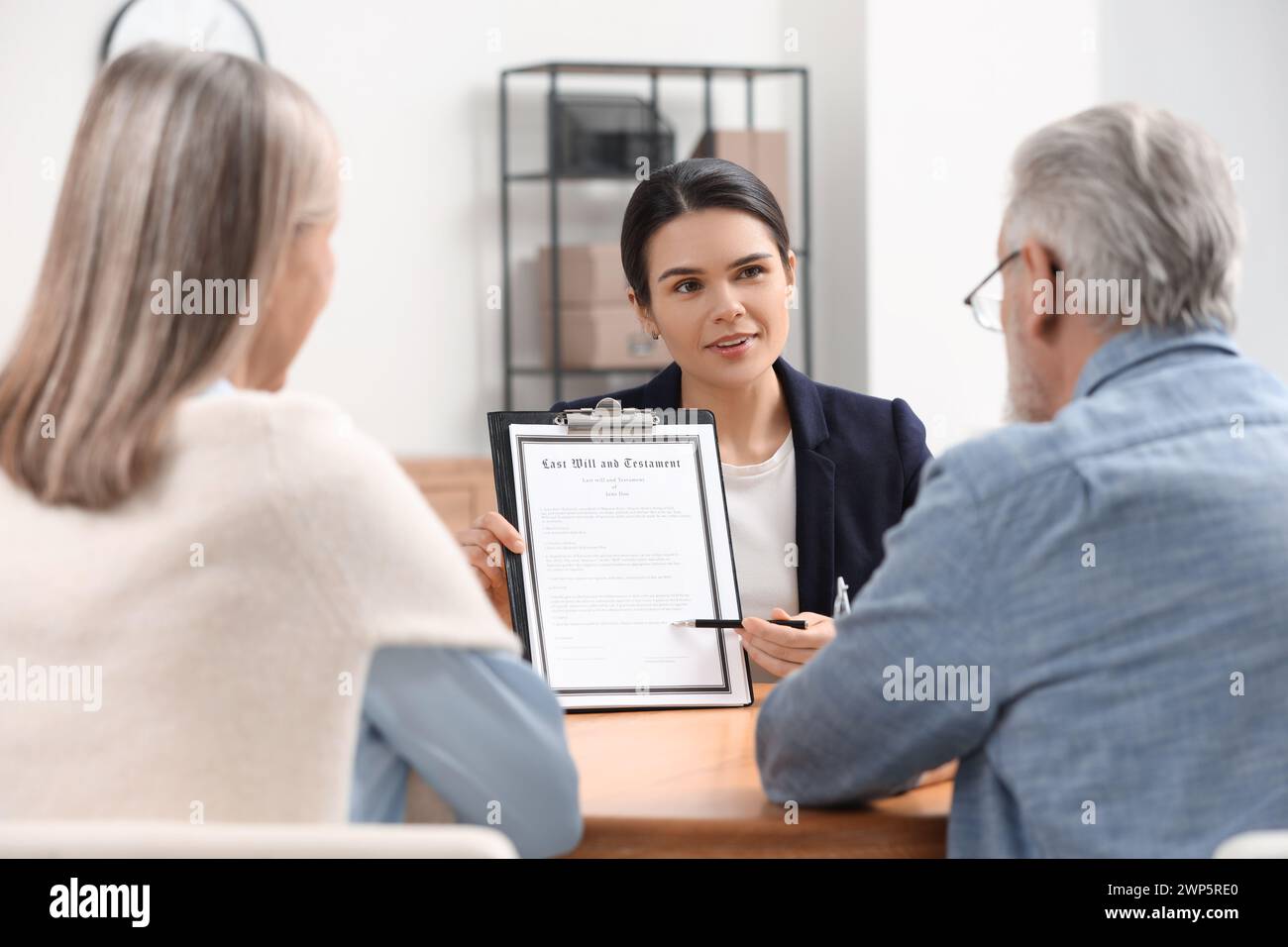 Notary showing client sign hi-res stock photography and images - Alamy