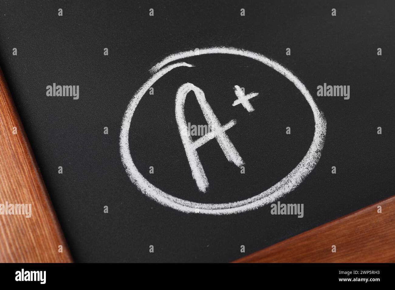 School grade. Letter A with plus symbol on blackboard, closeup Stock ...