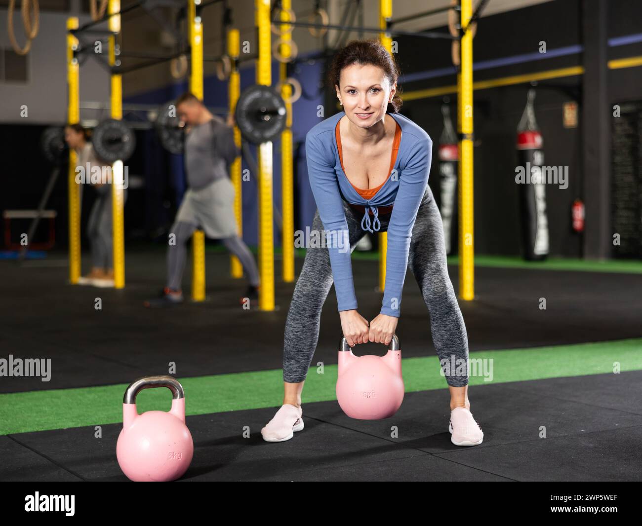 Female performing deadlift exercise hi-res stock photography and images ...