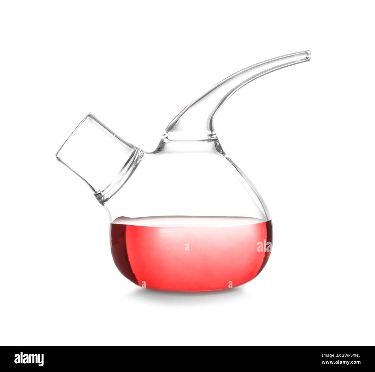 Retort flask with red liquid isolated on white. Laboratory glassware ...