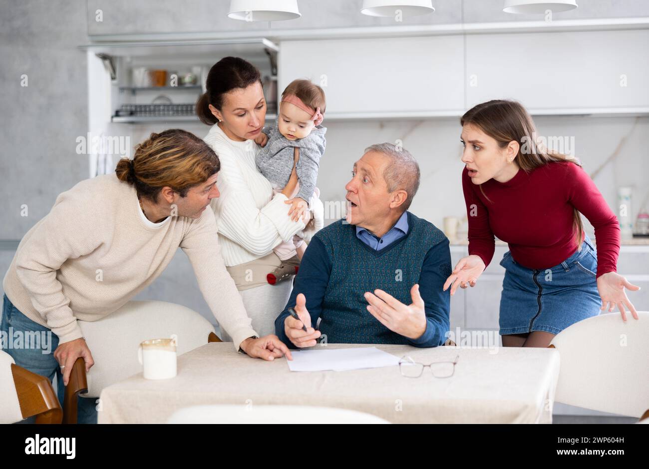 Family members discussing inheritance Stock Photo - Alamy