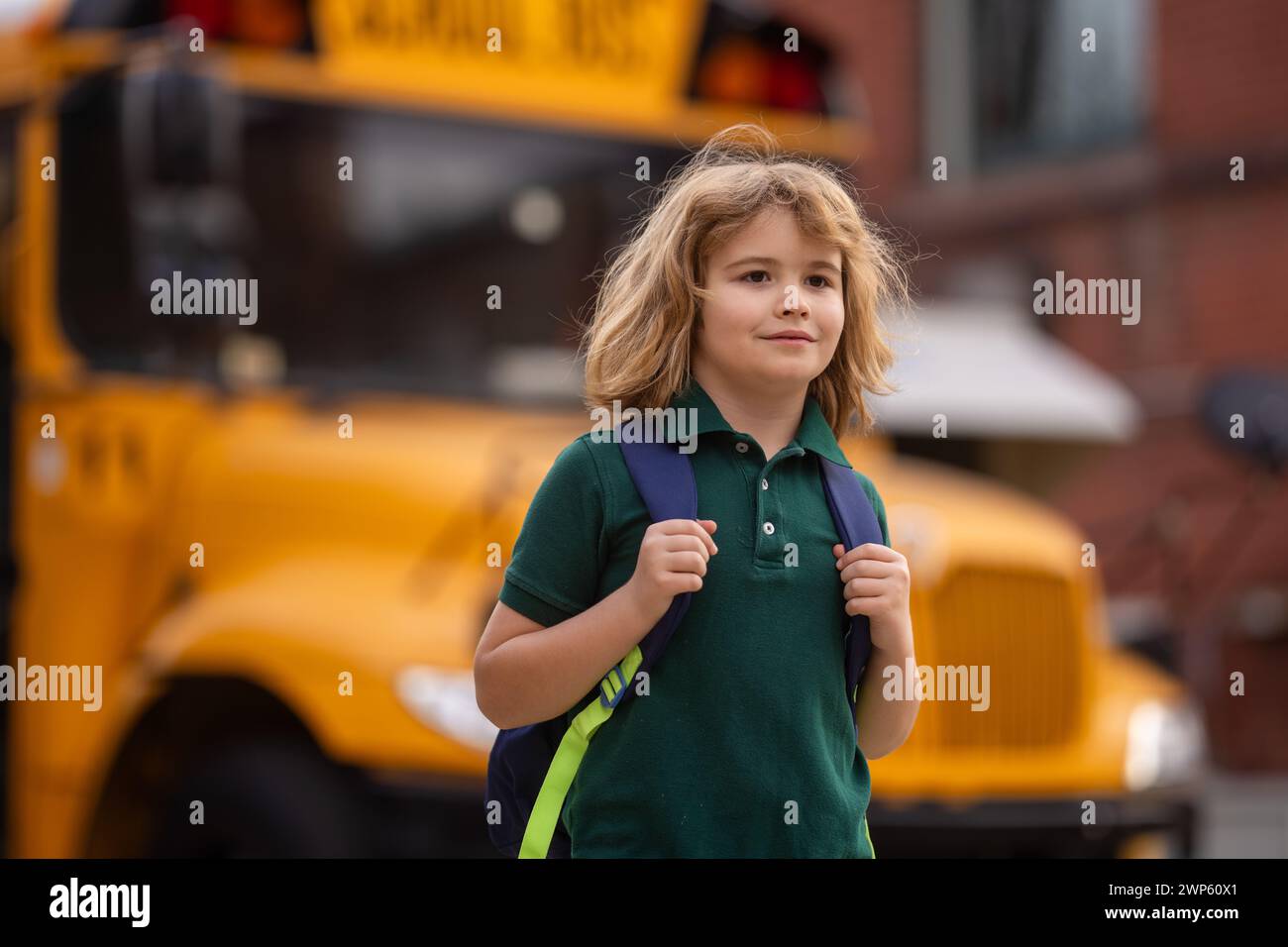Educational concept. Pupil getting on the school bus. American School ...