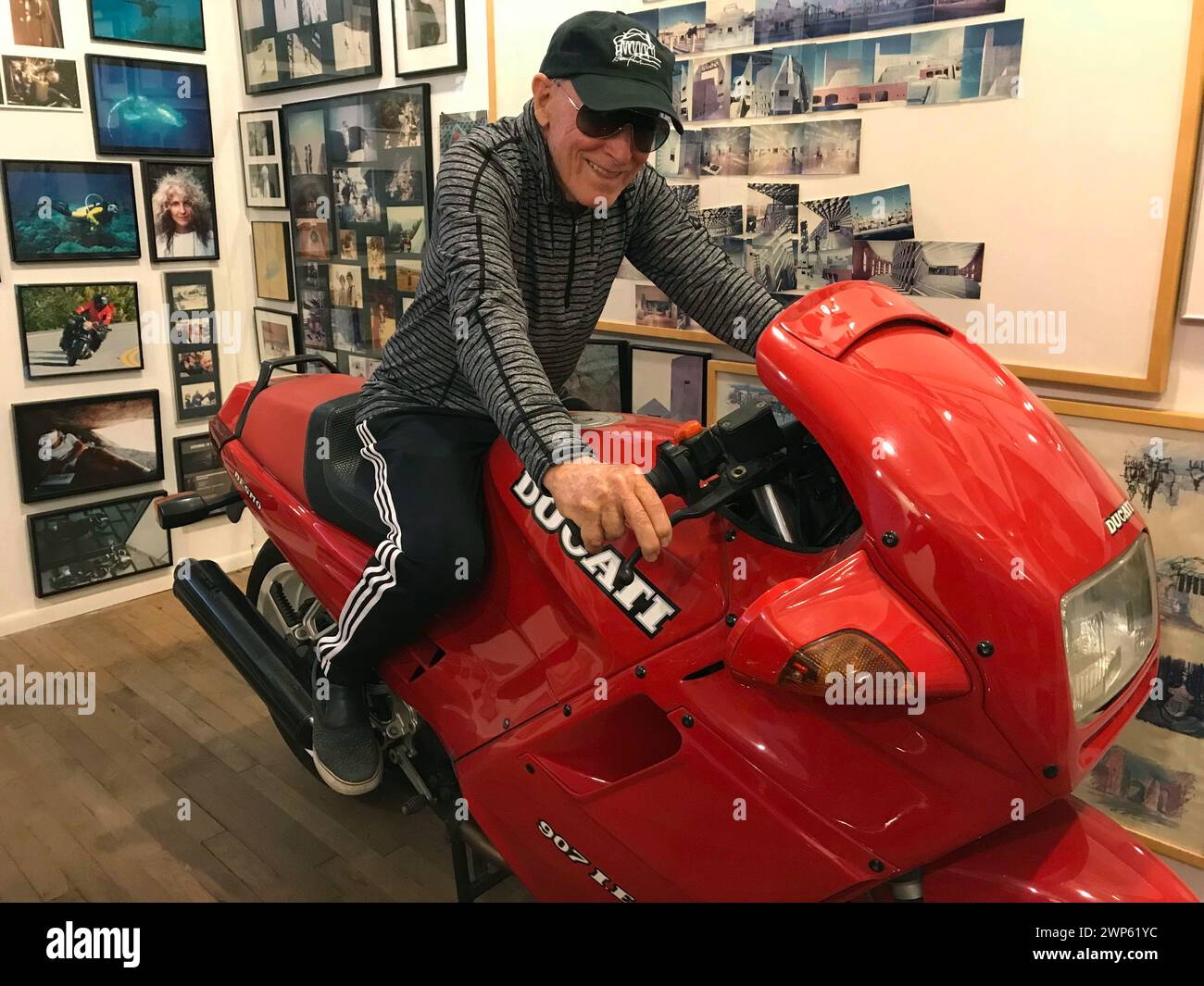 Renowned architect and motorcycle aficionado Antoine Predock sits on ...