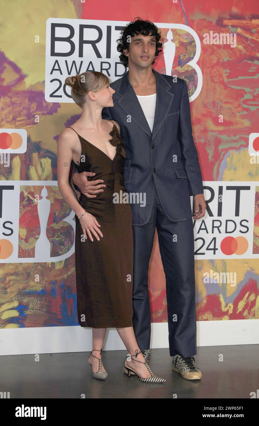 London, UK. Maddie Waterhouse and Noah Sapon at the BRIT Awards 2024 ...