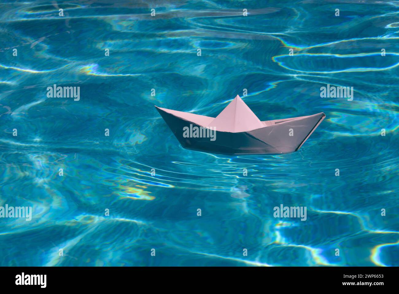 Origami ship. Paper ship sail. Paper boat on the sea water background ...