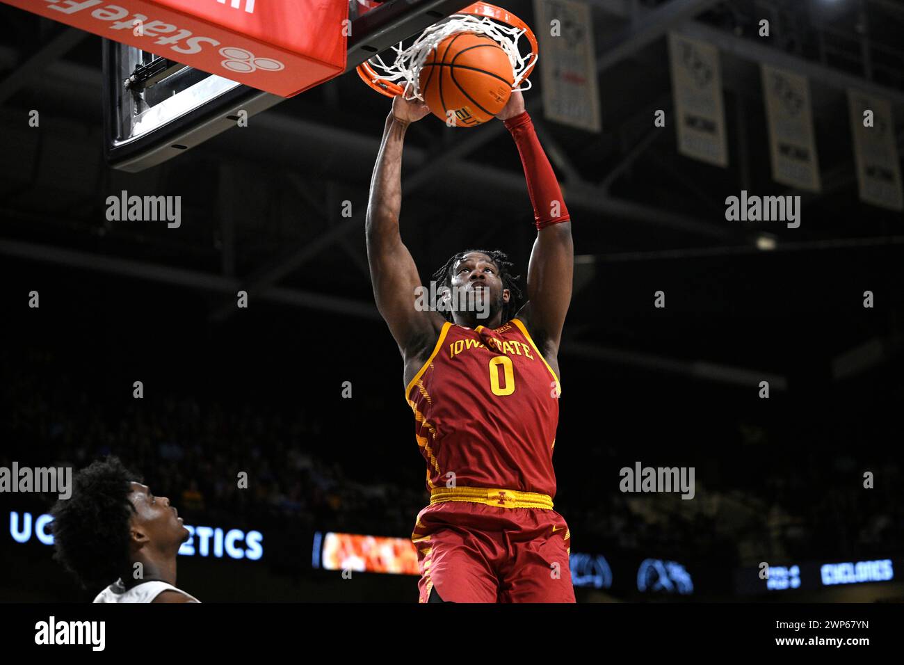 Iowa State forward Tre King (0) dunks as Central Florida guard Jaylin ...