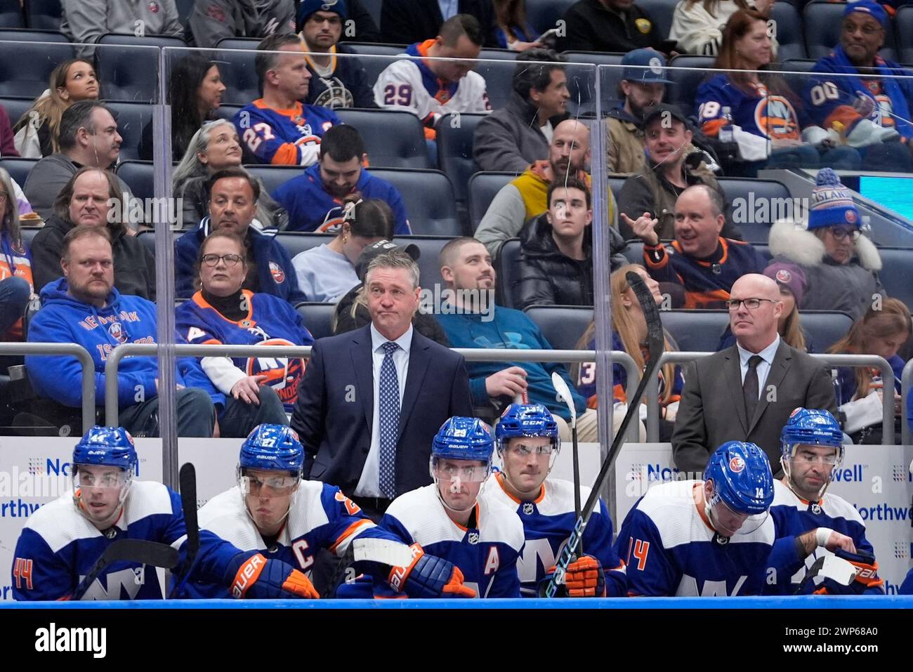 New York Islanders head coach Patrick Roy watches with his players ...