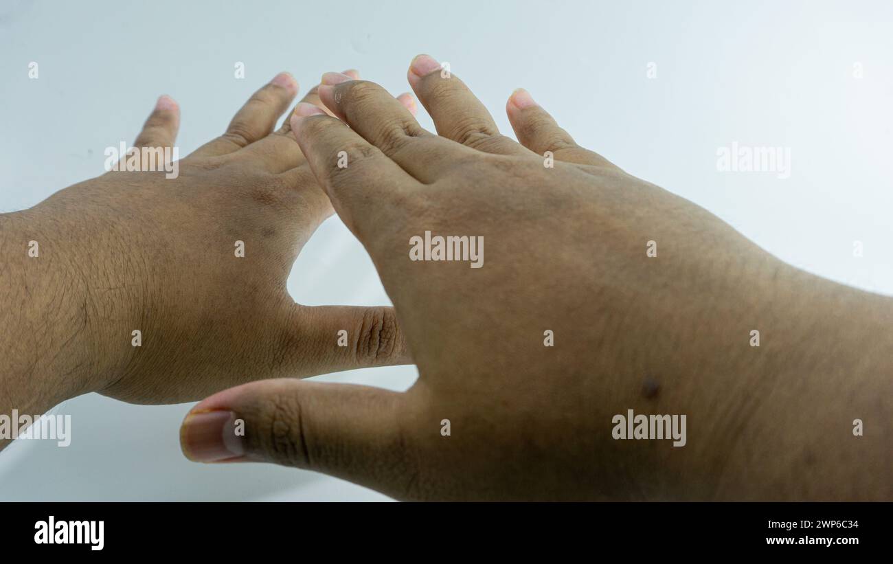 Two-handed pose of open hands to calm others or to surrender isolated ...