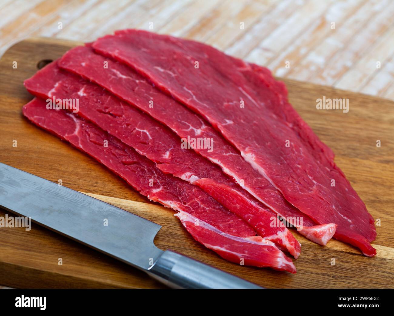 Image of raw a beef fillet cut into pieces Stock Photo - Alamy