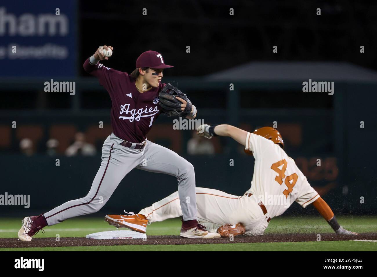 AUSTIN, TX - MARCH 05: Texas outfielder Max Belyeu (44) slides into ...