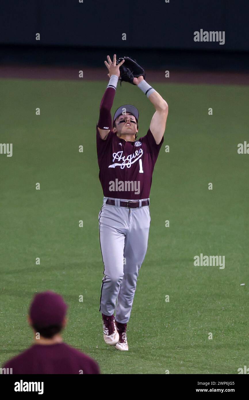 AUSTIN, TX - MARCH 05: Texas A&M infielder Jack Bell (1) catches a fly ...
