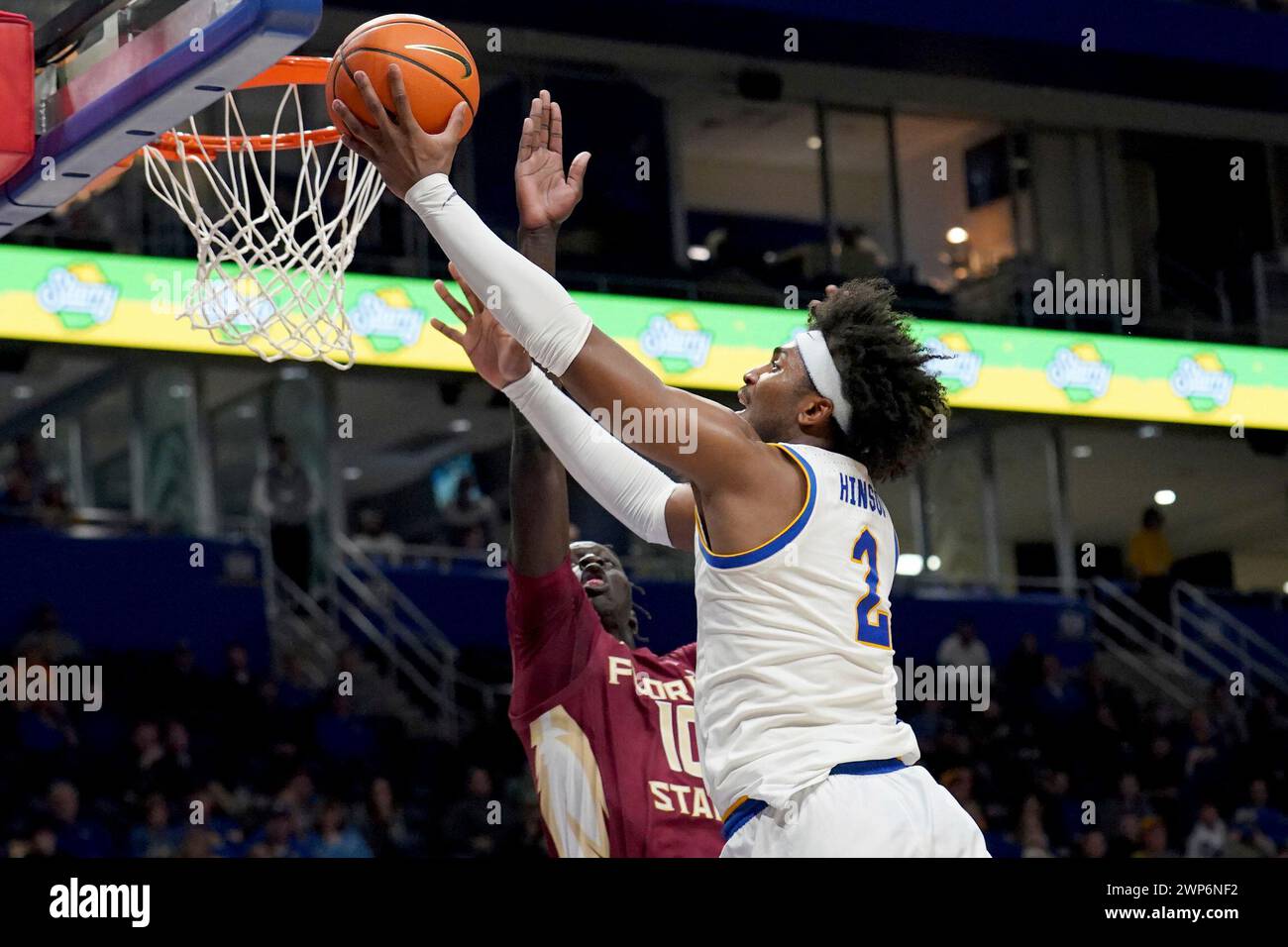 Pittsburgh's Blake Hinson (2) lays the ball up against Florida State's ...