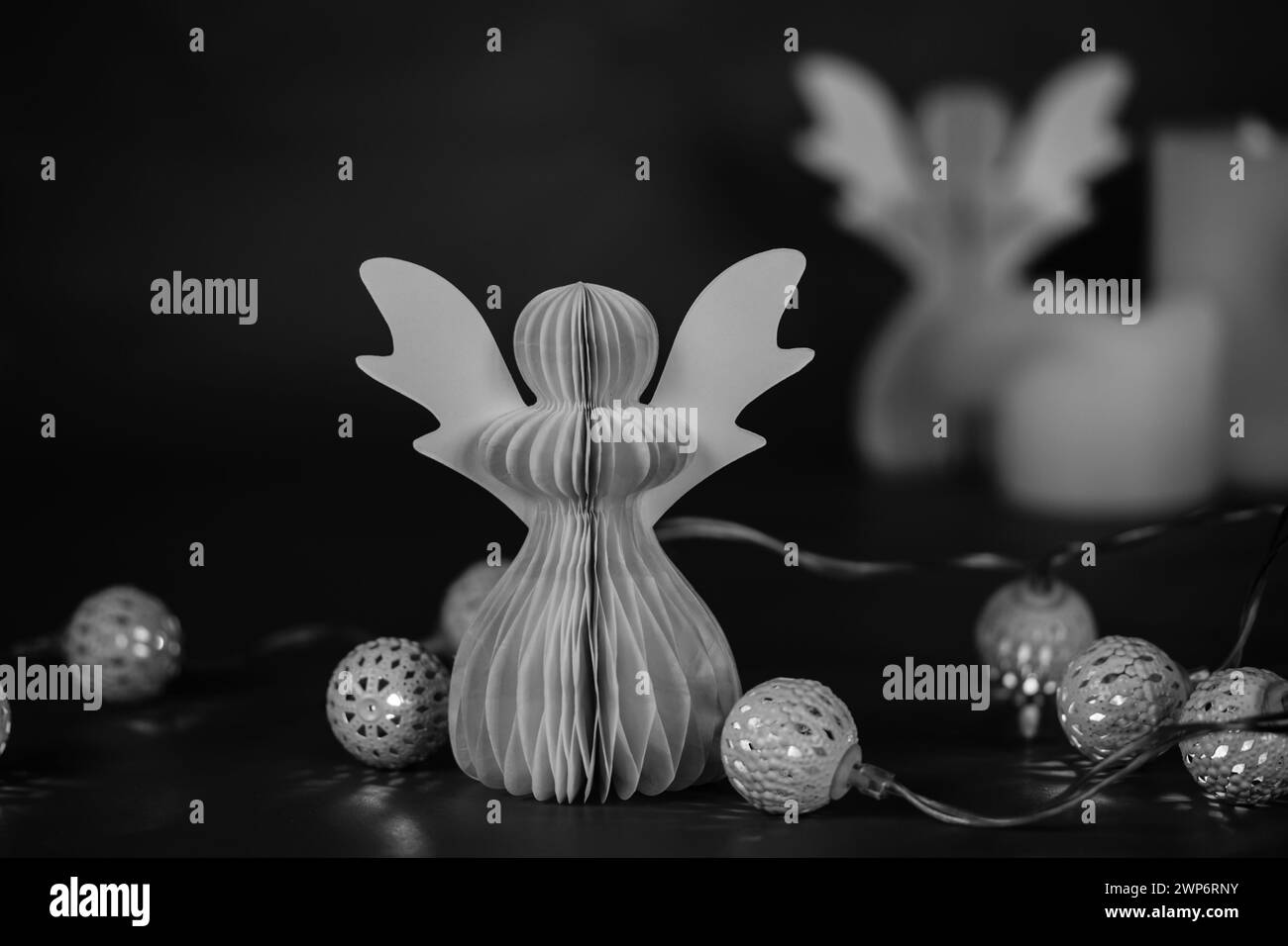 DIY paper angel on a dark background. Religious symbols, festive ...