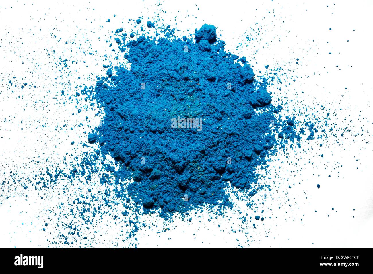 Closeup view of blue Holi powder isolated over a white background. Holi ...
