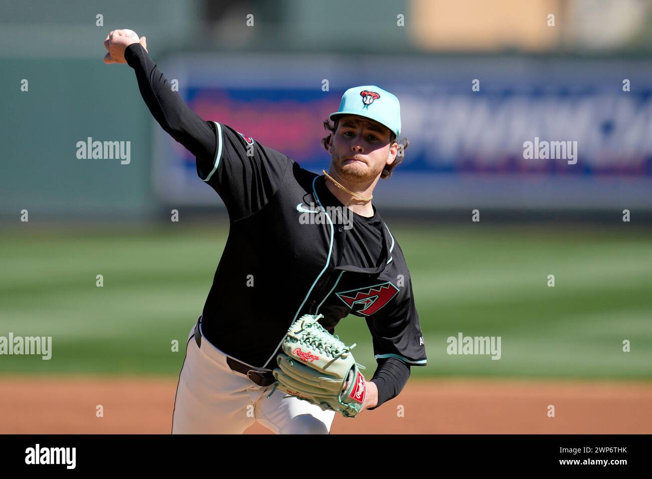 Arizona Diamondbacks starting pitcher Ryne Nelson warms up during the third inning of a spring ...