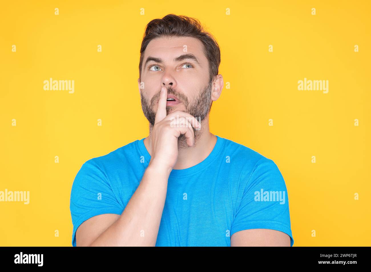 Portrait of thoughtful guy making choice. Handsome man thinking on ...